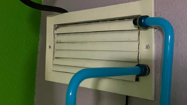 A user cools his gaming PC with an air conditioner to reduce the ...